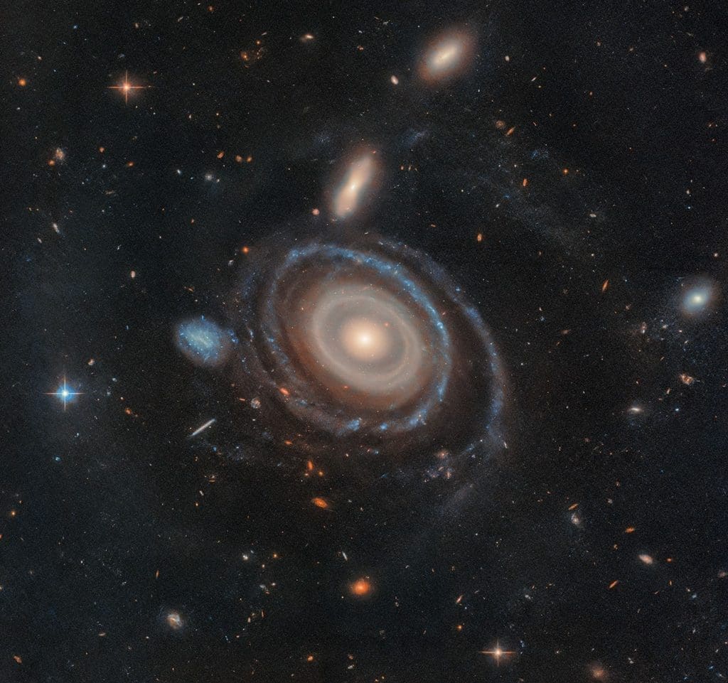 Hubble Captures Galaxy With Nine Star Filled Rings